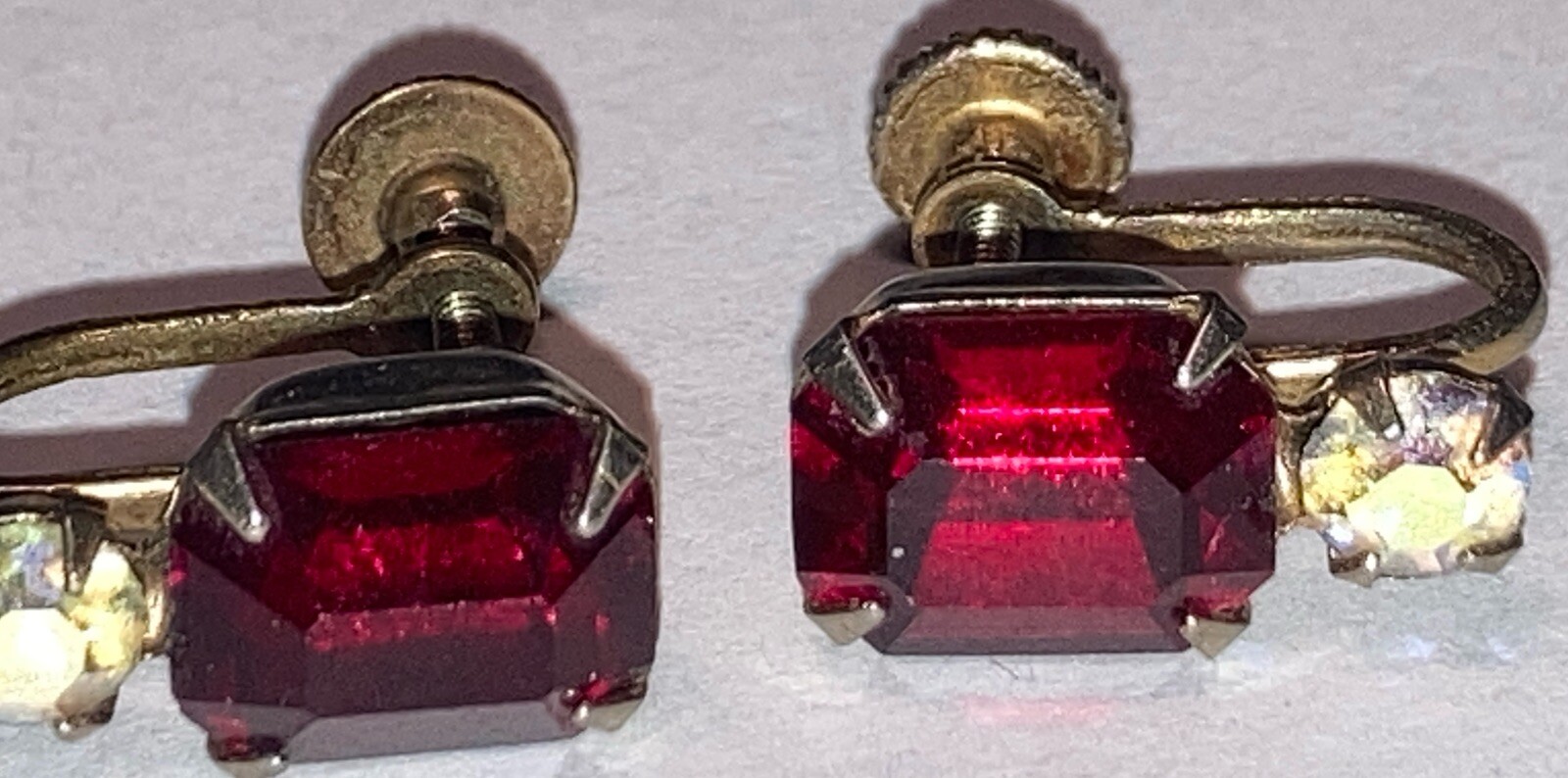Emerald cut Ruby Red color & Aurora Borealis Screw Ba… - Gem