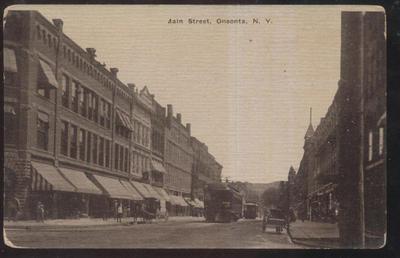 POSTCARD ONEONTA NY/NEW YORK MAIN ST BUSINESS STORE FRONT WITH TROLLEY ...