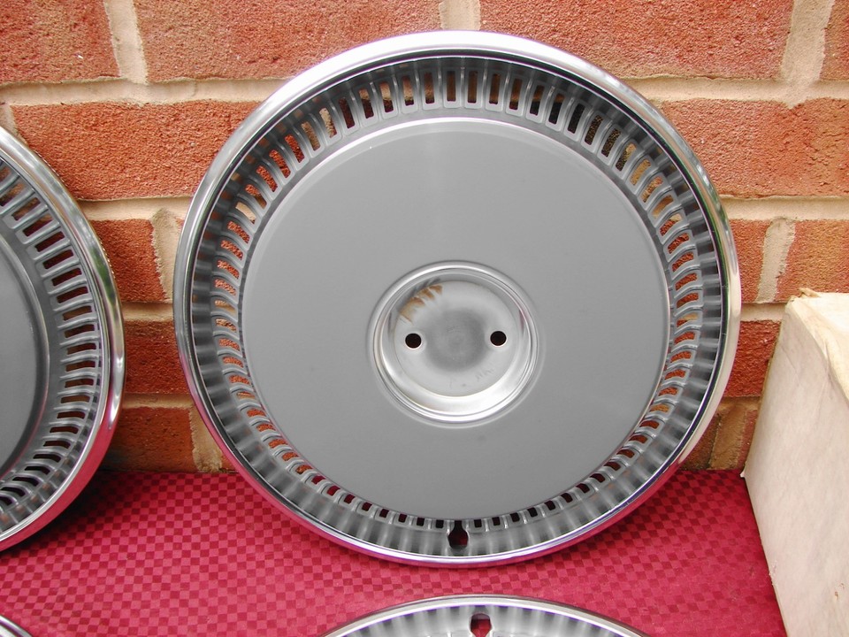 75 CHEVROLET NOVA NOS BODY COLORED NOS 14 INCH HUBCAPS GM pt # 994688 ...