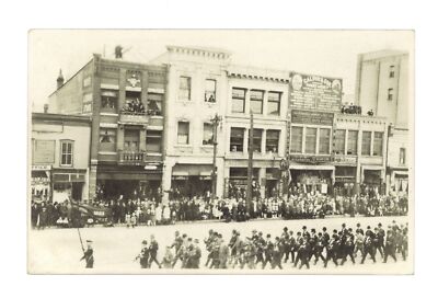 Parade Winnipeg a parade and crowds of people line the street and- Old ...