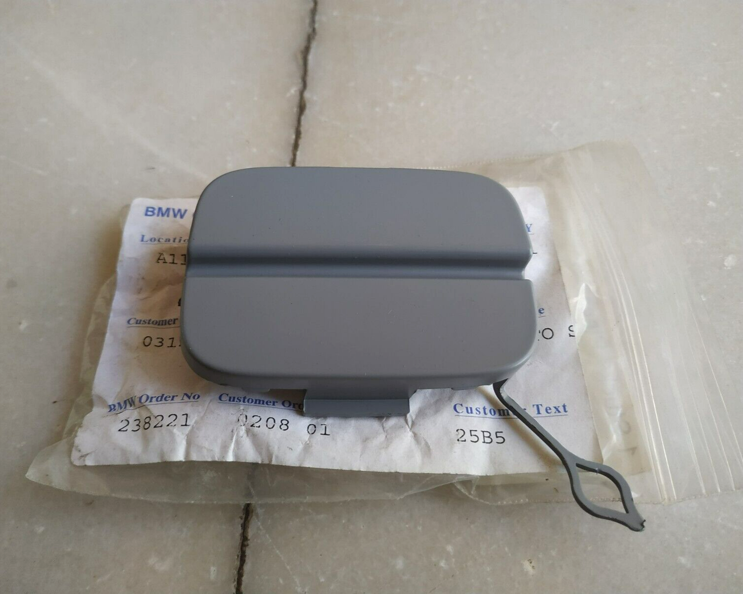 MINI R56-R57 bumper cover tow fitting primed right NEW GENUINE ...