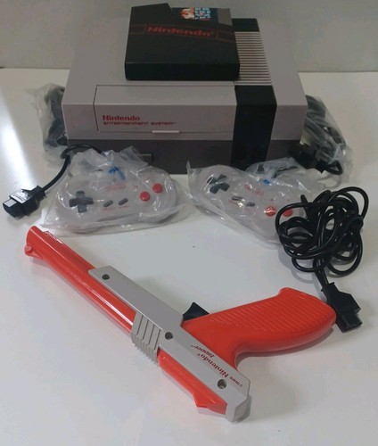 Nes Console with controllers , zapper, and Mario Bros and Duck hunt ...