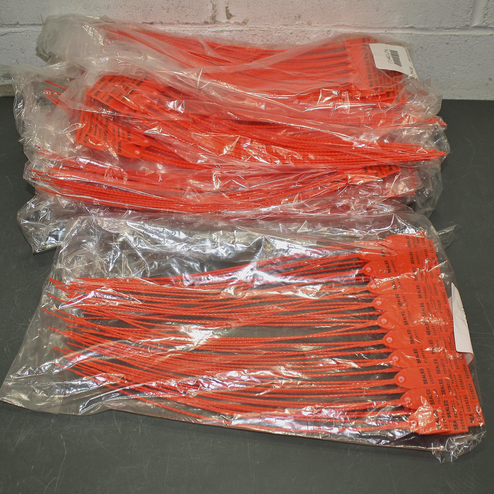 (700) Tydenbrooks Serial Numbered Seals, 18" Pull Tight Strap Shipping ...