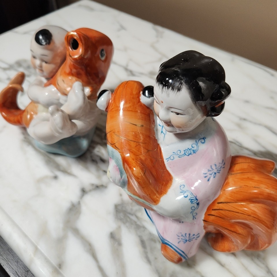 Vintage Chinese Porcelain Figurines Boy and Girl Holding Large Orange ...