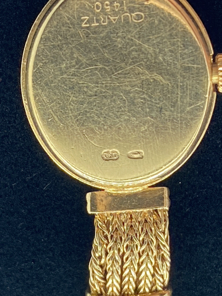 VTG 750/18K Omega Oval Quartz Watch 1450 | eBay