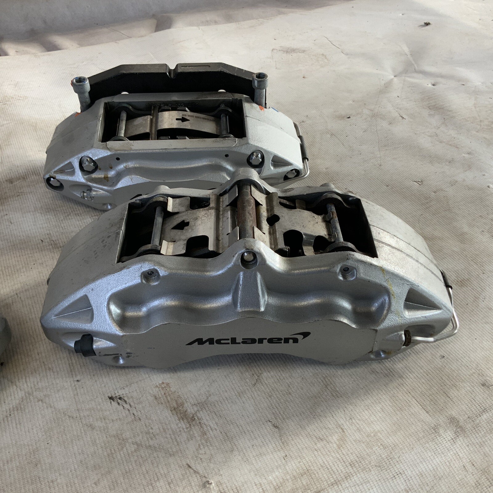 Mclaren Full Brake Caliper Set Including Pads Genuine OEM Used | eBay UK