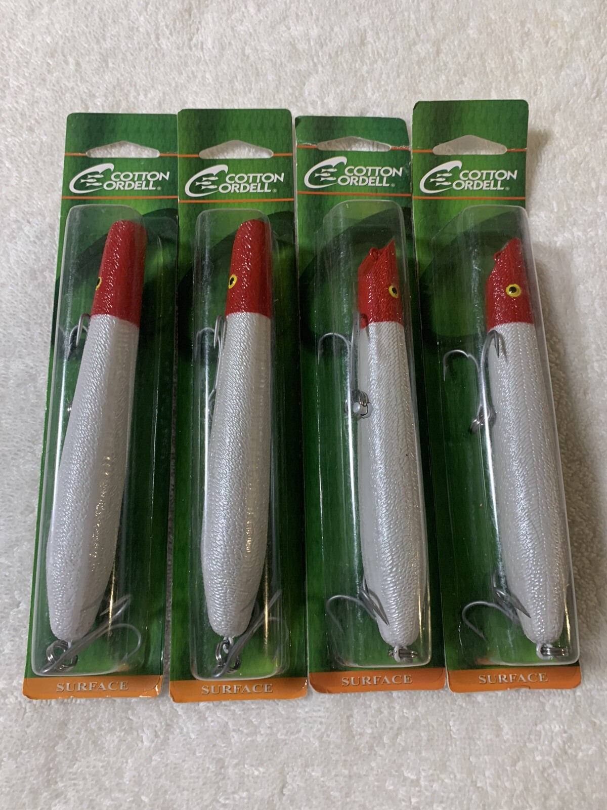 (LOT OF 4) COTTON CORDELL PENCIL POPPER 4.5" 3/4oz. PEARL RED HEAD NIP ...