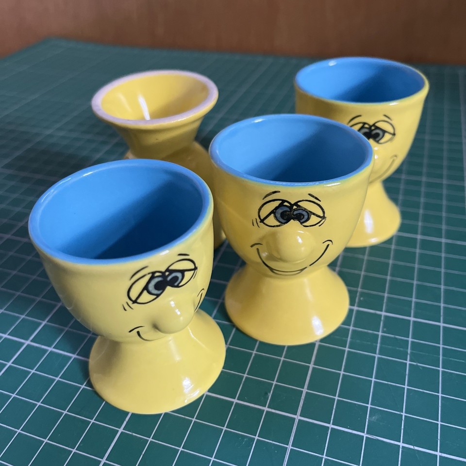 Vintage Trade Wind Ceramic Set 4 Egg Cups yellow blue Funny Face Design ...
