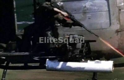 Vietnam War Photo Door gunner fires machine gun with tracer bullet 530 ...