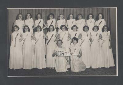 PHOTOGRAPH OF BEAUTY PAGEANT CONTESTANTS WITH ORIENT SIGN - IN MATTE ...