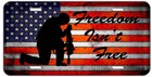 PATRIOTIC LICENSE PLATE FREEDOM ISNT FREE SOLDIER AND FLAG AUTO TAG | eBay