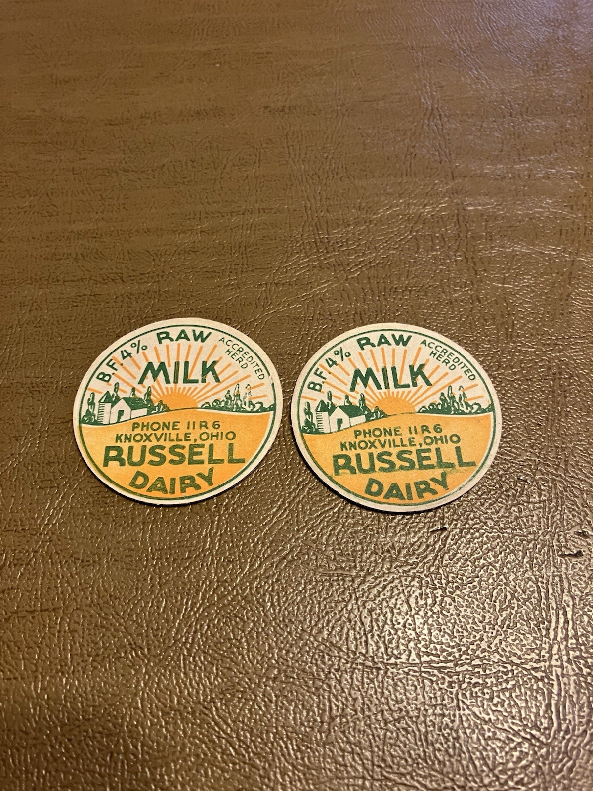 Lot of 2 Russell Dairy Knoxville,Ohio.Milk Caps | eBay