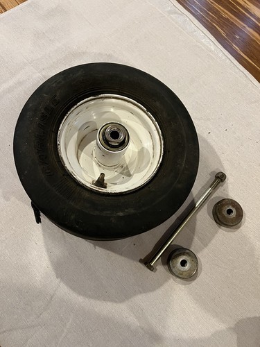 Exmark 117-0361 Front Caster Wheel Asm( Tire Has Hole In It) | eBay