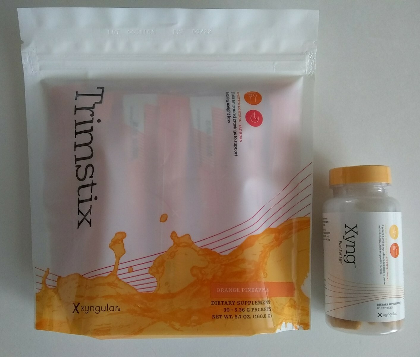 Xyngular Orange Pineapple TRIMSTIX & XYNG Energy / Fat Loss Exp. 2025/ ...