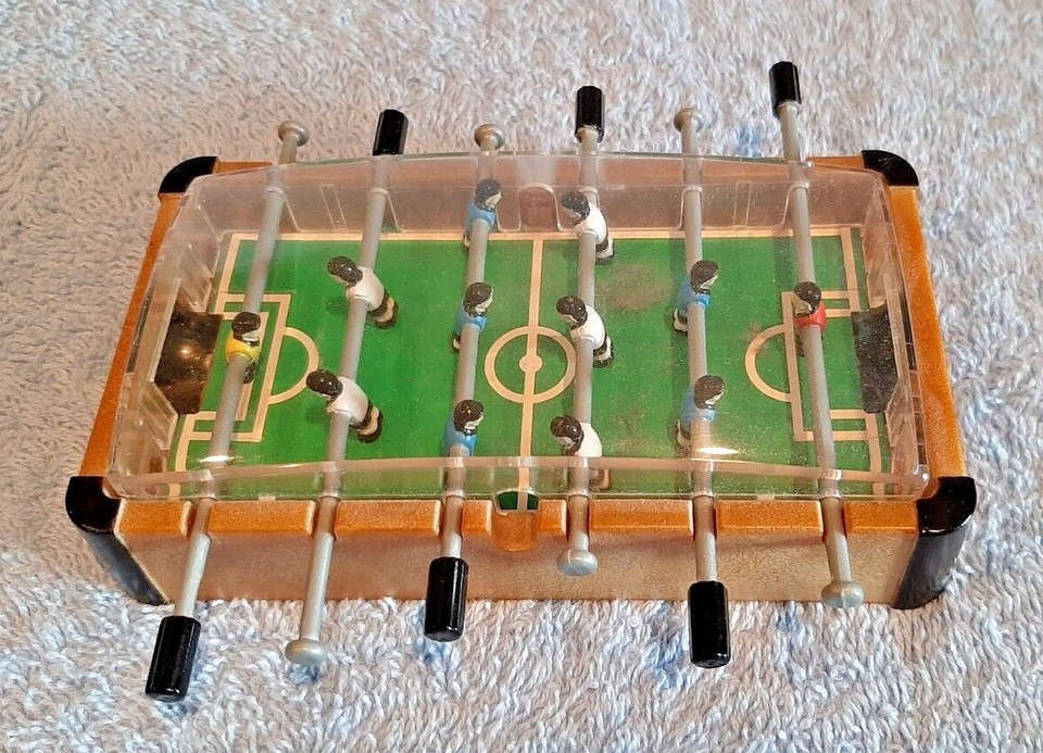 PORTABLE HANDHELD TABLETOP FOOSBALL GAME- 4.5" X 4"; Cute-Play Anyware ...