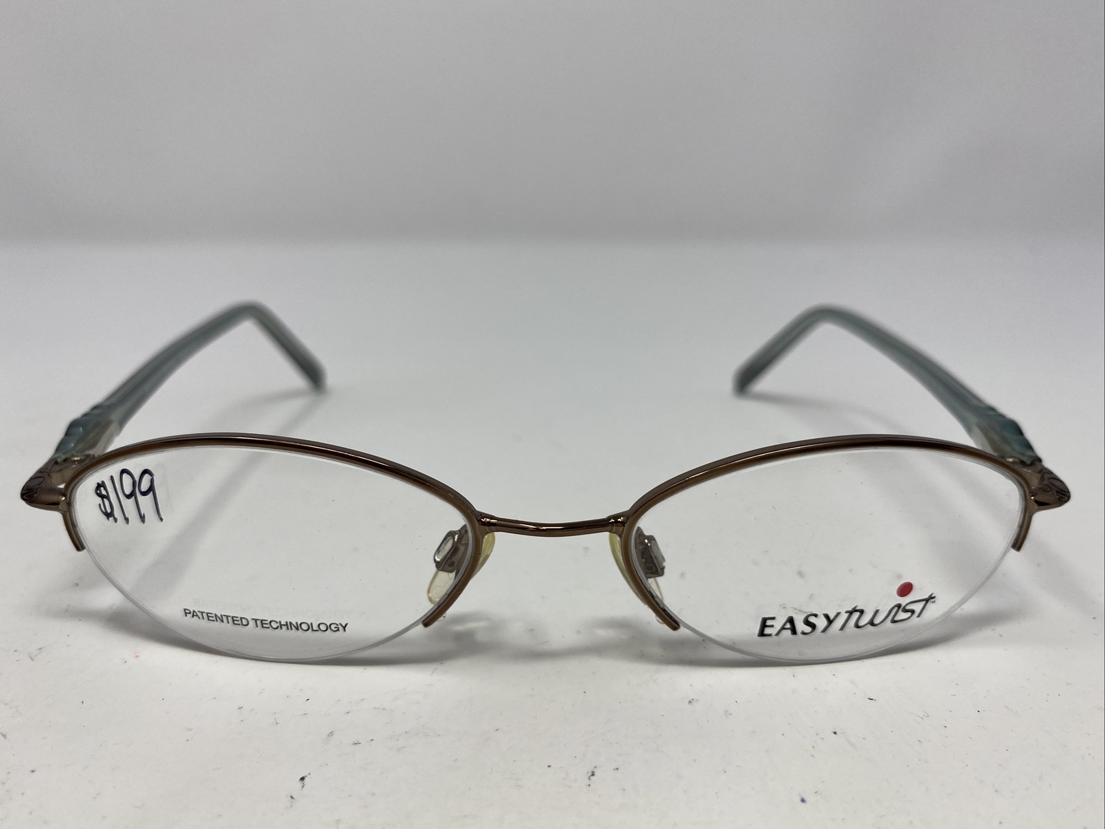 Easy Twist MOD EASYTWIST 833 10 50-18-135 Brown Half Rim Eyeglasses ...