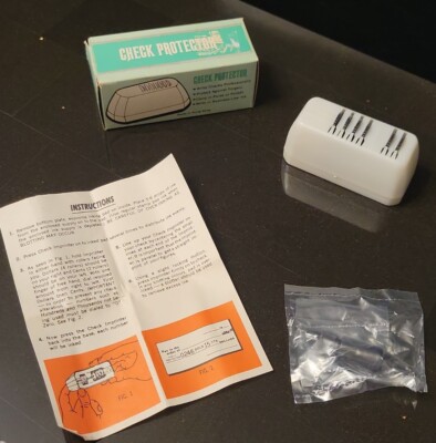 Binding, Embossing & Printing - Check Protector