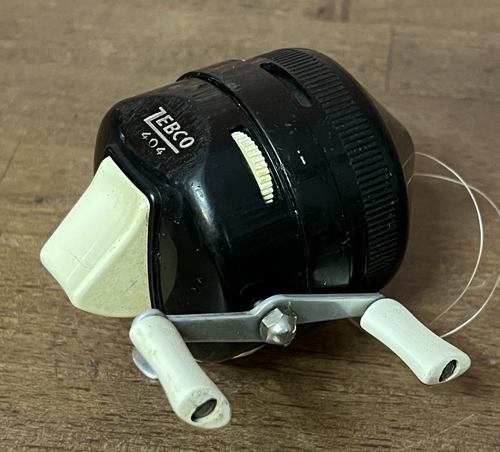 Vintage Zebco 404 Fishing Casting Reel Black w/ White Button Handles ...