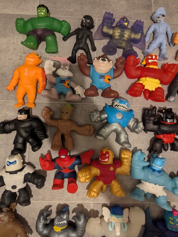 (X38) In Total . A collection of Heroes of Goo Jit Zu action figures ...