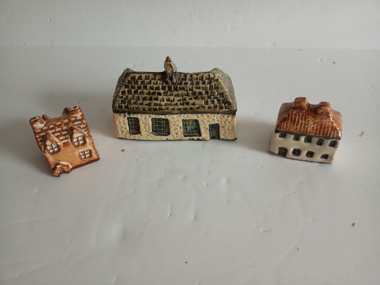 COUNTRYSIDE COLLECTION AND TWO OTHER POTTERY MINIATURE COTTAGES /MODEL ...