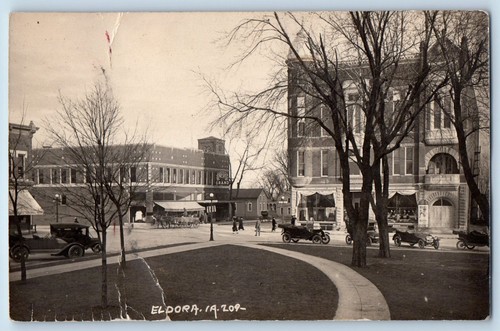 Eldora Iowa IA Postcard RPPC Photo Street View Grand Buildings Cars ...