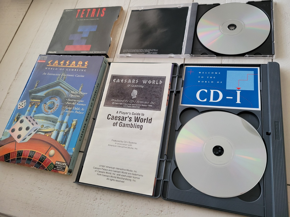 Lot of 13 CD-I Games -TETRIS, Palm Springs Open, Power Hitter, More ...