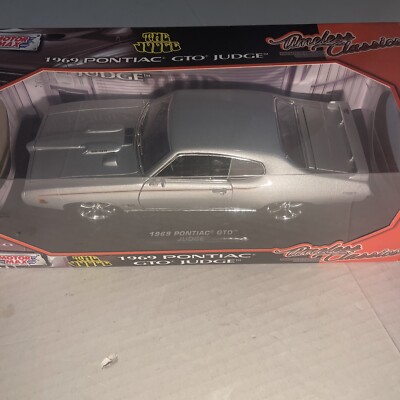 1969 PONTIAC GTO JUDGE SILVER MET. 1/18 DIECAST MODEL CAR BY MOTORMAX ...