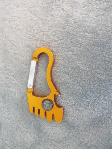 Foot shaped key holder/compass/bottle opener | eBay