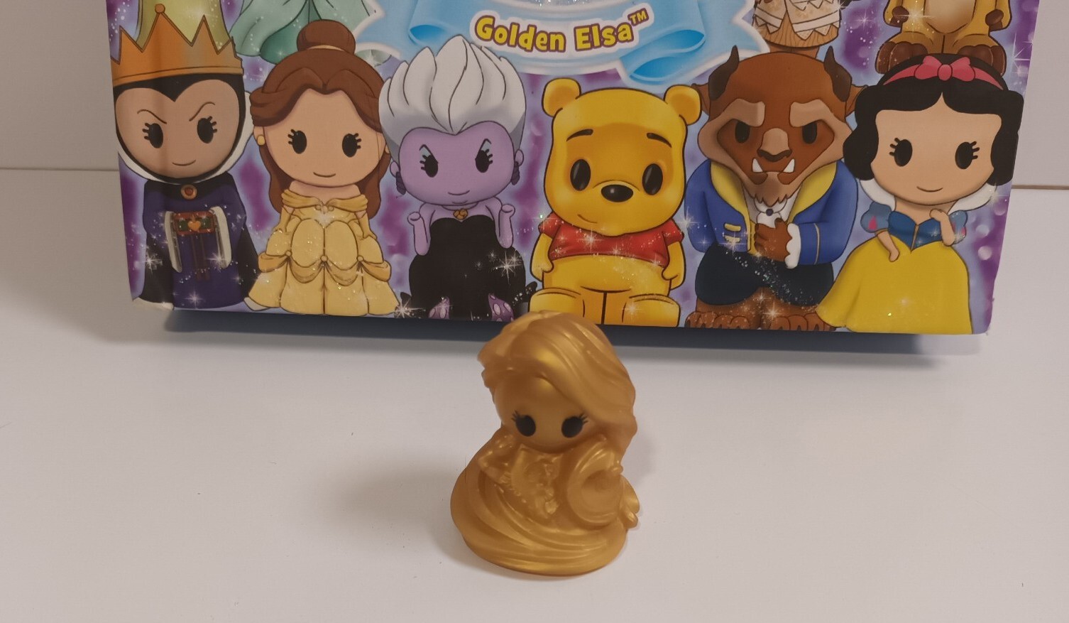 Disney Ooshies: Collector's Guide With Limited Edition Golden Elsa ...