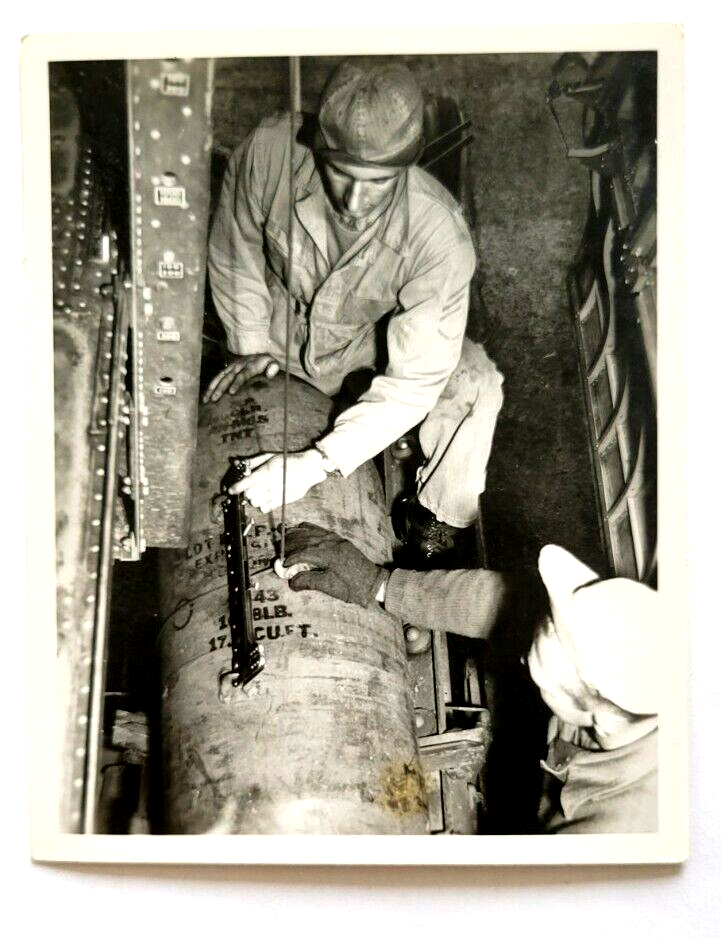 WWII Era Soldier Loading Bombs in Bomber Airplane Original Photo | eBay