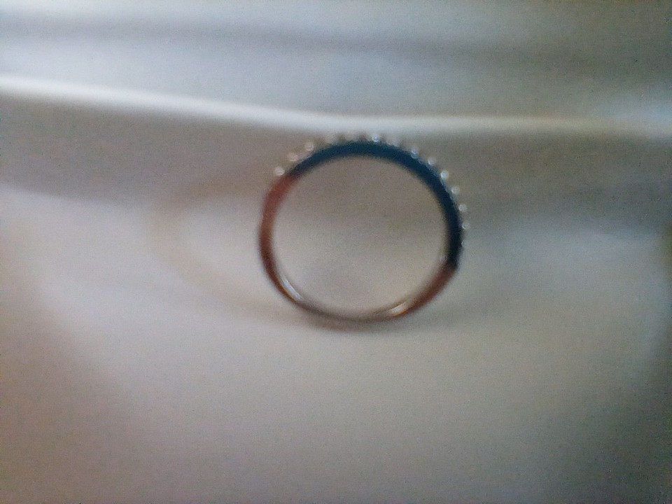 Ladies 925 Small White Band Size 5, Plus 6 small white stones. Two w ...