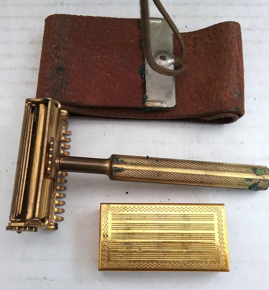 Auto Strop se Zebra themed box, Brass colored Razor, a blade pack and a ...