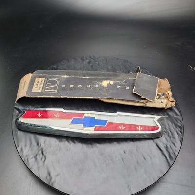 1956-58 Chevy Bel Air Impala NOS V8 Hood Emblem Crest 3721309 📦 | eBay