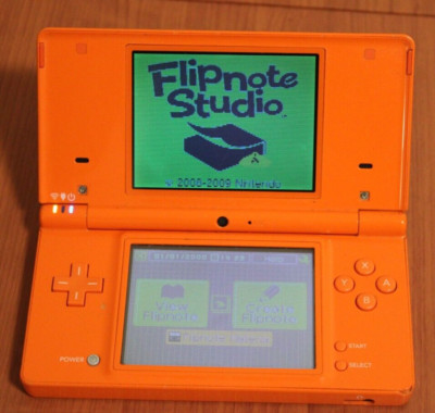 Nintendo DSi Orange handheld system Console FOR PARTS | eBay