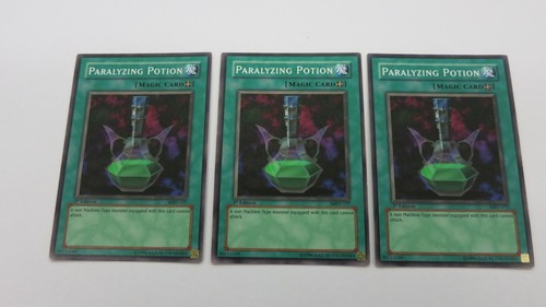 3x PARALYZING POTION METAL RAIDERS 1ST EDITION MRD-137 COMMON YUGIOH NM ...