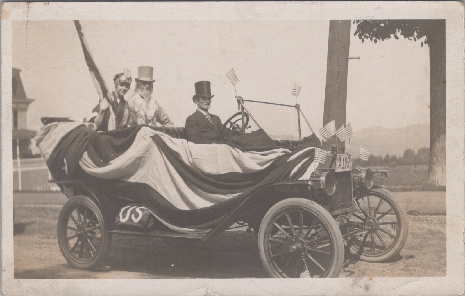 Uncle Sam Riding Patriotic Car Display US Flags Littleton NH 1912 RPPC ...