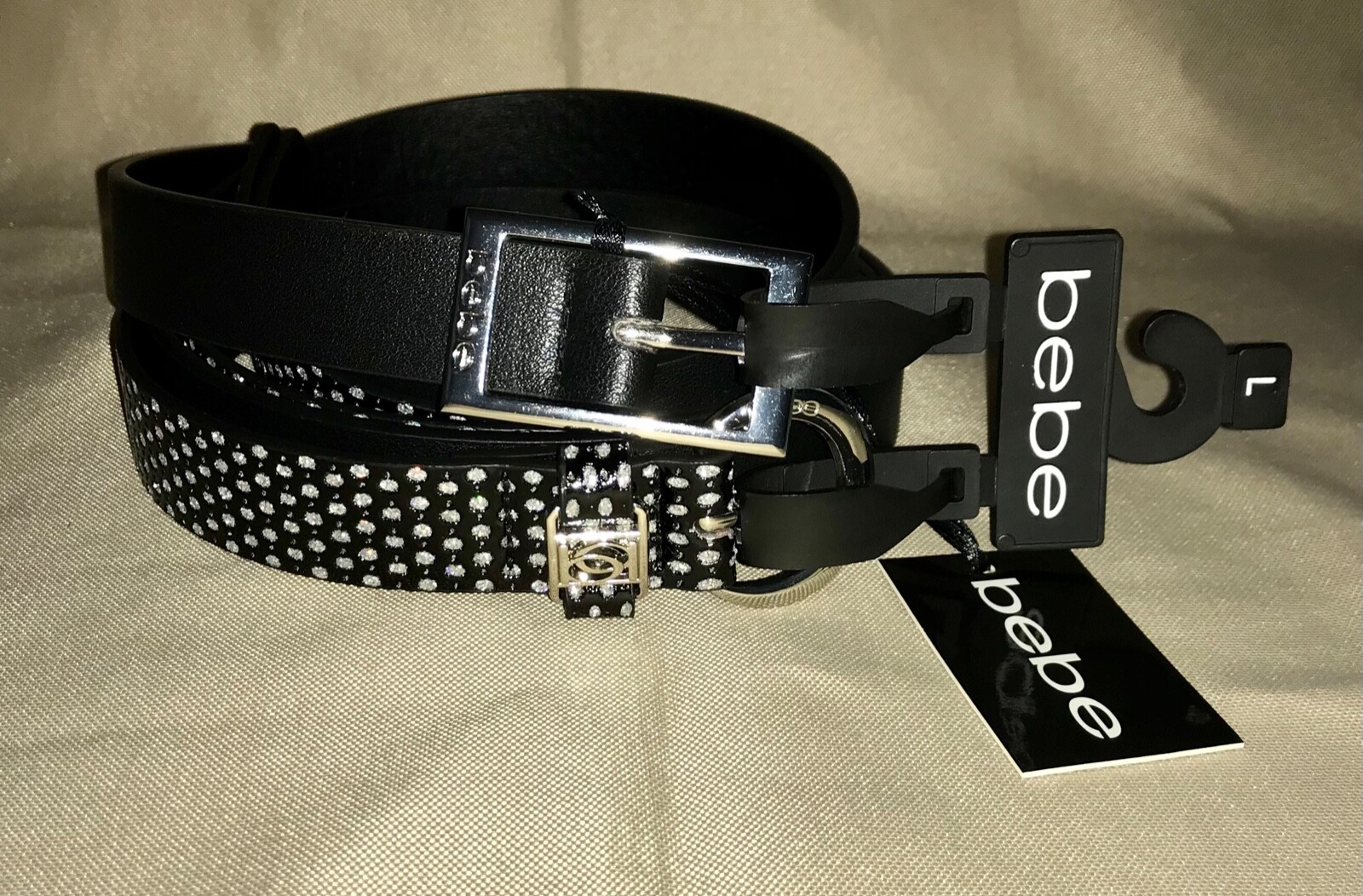 BEAUTIFUL BEBE BELTS, LARGE SIZE, BLACK AND SILVER APPLICATIONS.BRAND ...