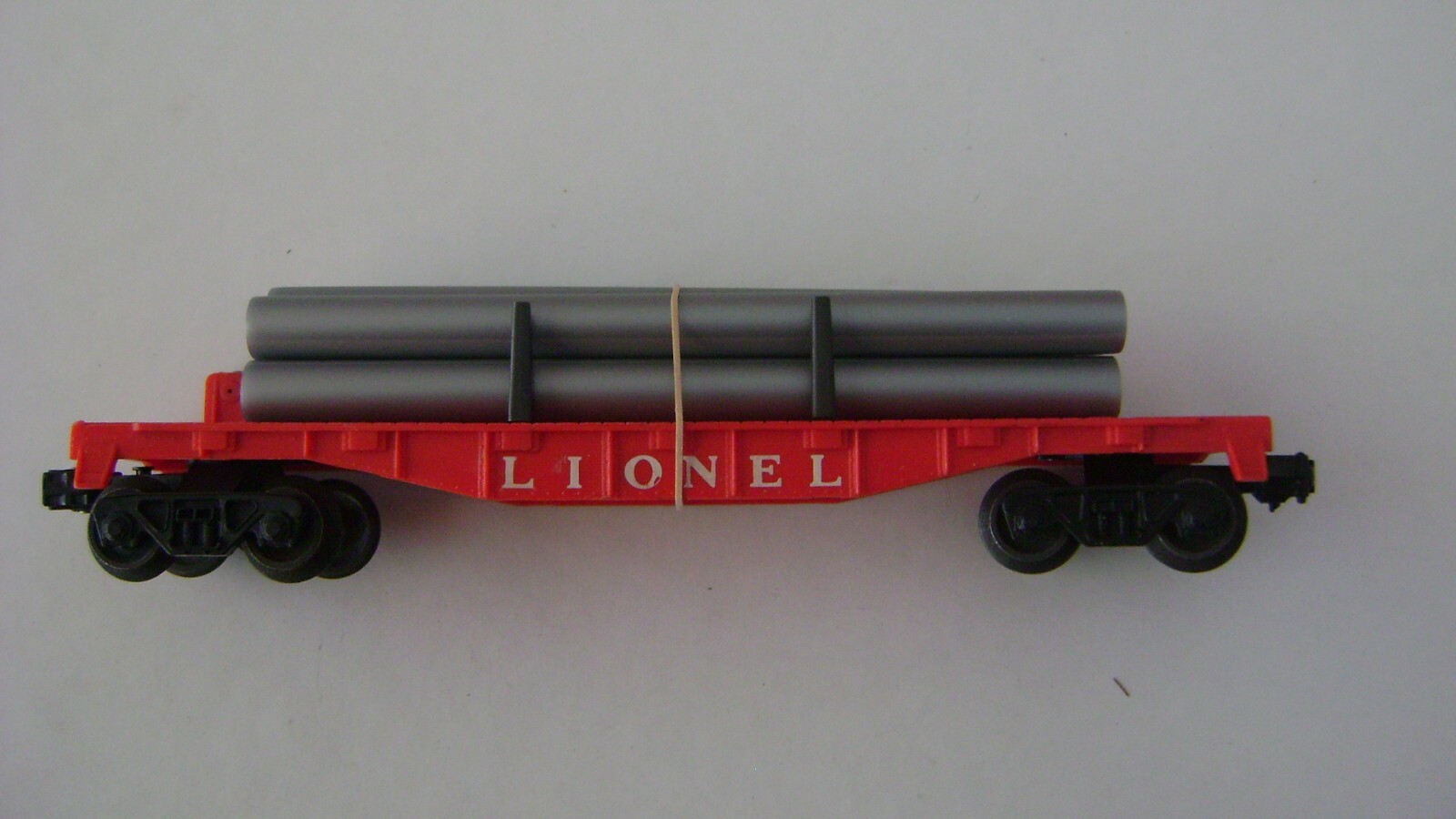 Lionel 6408 Flatcar w/5 pipes (mold 6511-2-no numbers) mint | eBay