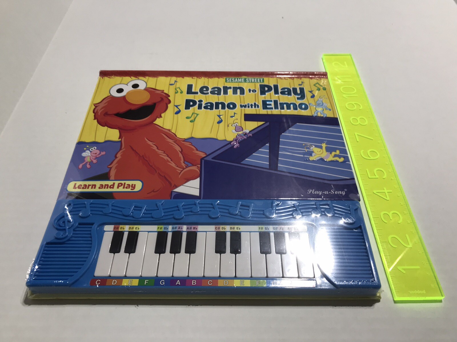 Play & Learn Piano Elmo by Publications International Ltd. Staff (2011 ...