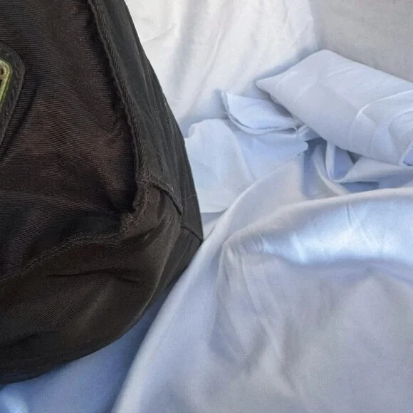 Metal handles nylon Prada bag with black Prada lining. | eBay