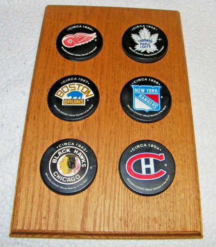 VINTAGE HOCKEY HALL OF FAME ORIGINAL SIX HOCKEY PUCKS & DISPLAY BOARD ...