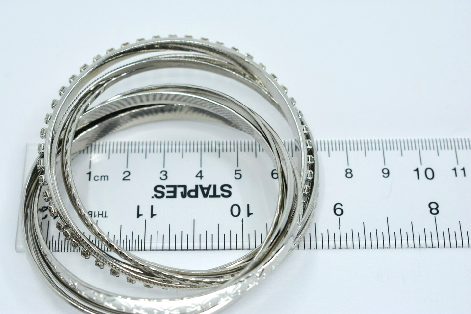 Bangle Bracelets Silver Tone Stack of 8 Connected Nice Bangle Bracelets ...