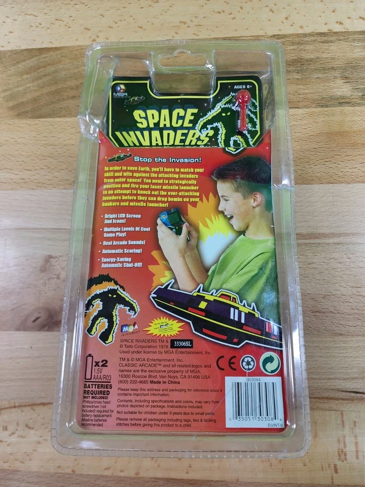 MGA Entertainment 2005 NEW Electronic Handheld Space Invaders Classic ...