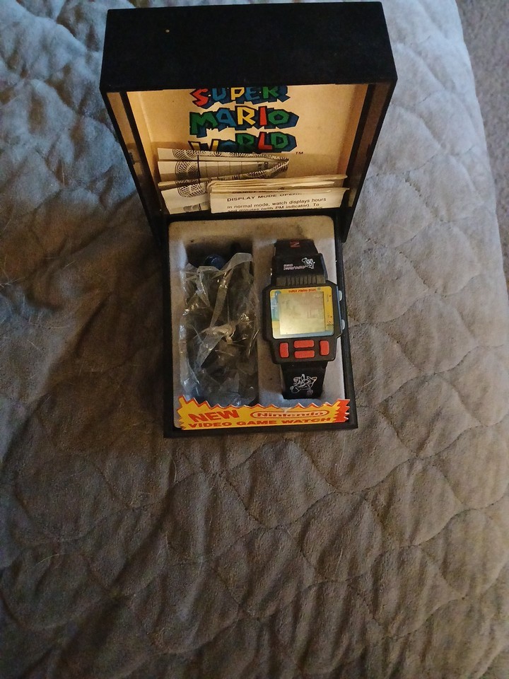 Nintendo Super Mario World Vintage Watch Game with Ear Buds | eBay