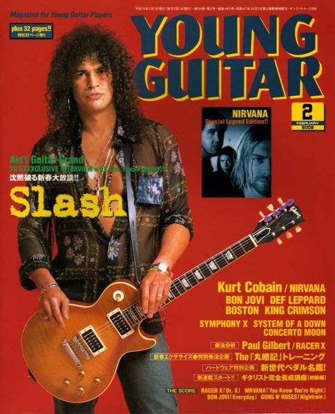 Young Slash Playing Guitar