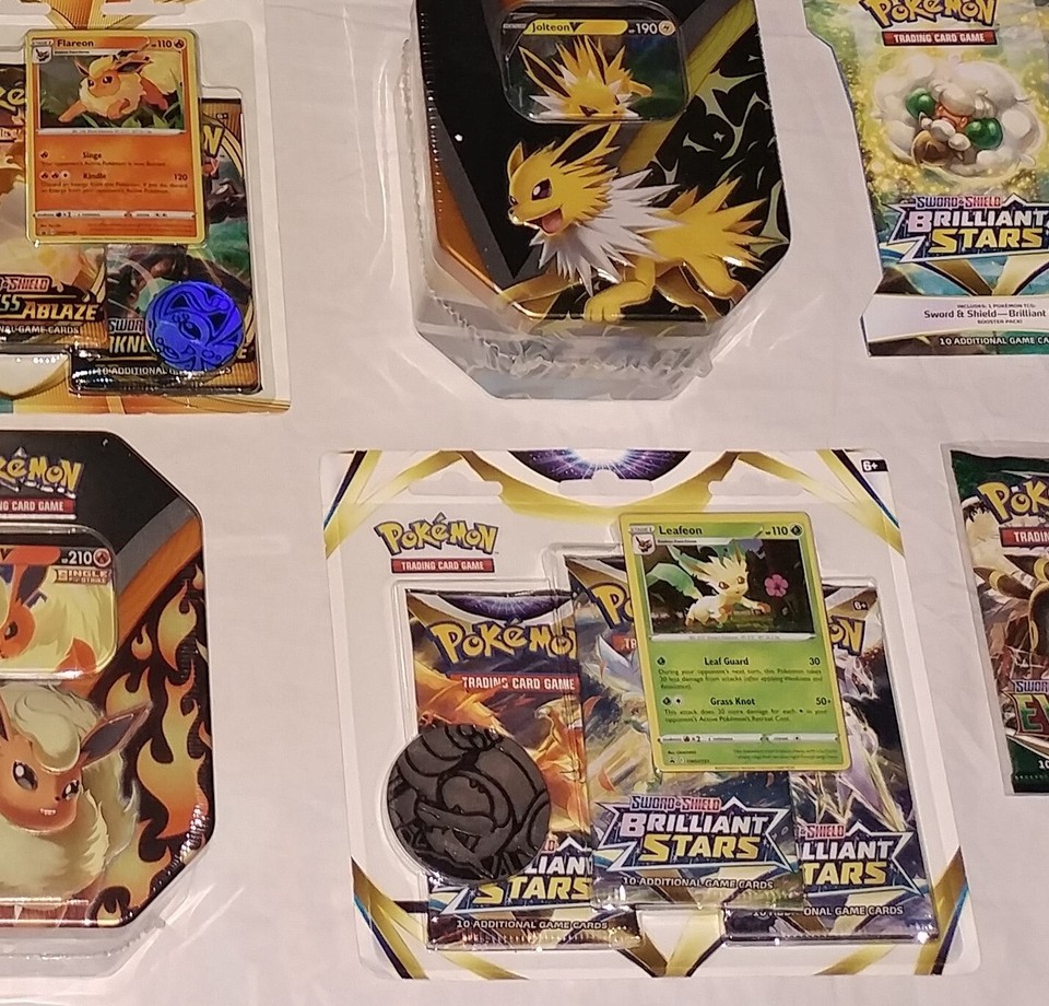 57 Pokemon Packs 🤗Tins - 3 Pack Blister Packs - 14 Evolving Skies Packs ...