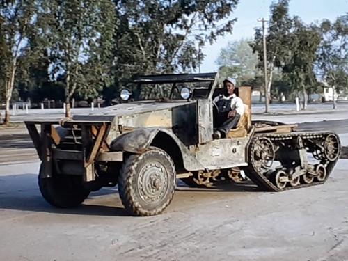 Man in US Army Surplus M2 Halftrack on City Street, California 1950's ...