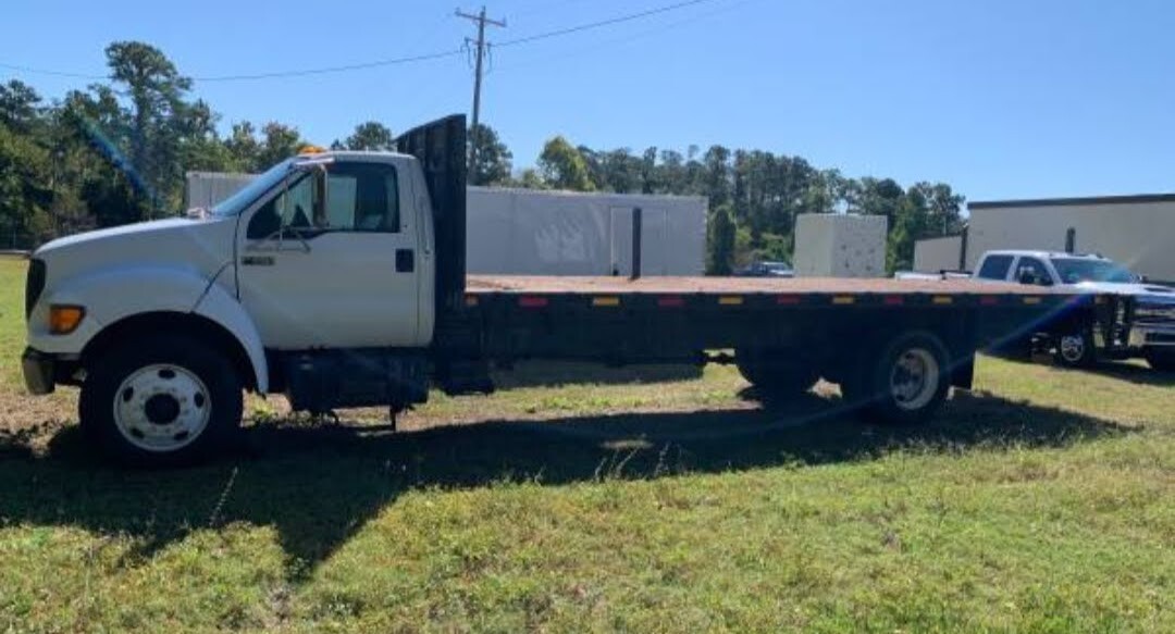 2002 Ford F650 flatbed truck 24ft liftgate and cage runs great | eBay