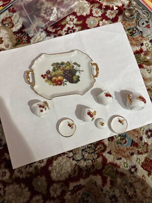 Tiny tiny tea set, vintage design and thrifted, missing tea pot though ...