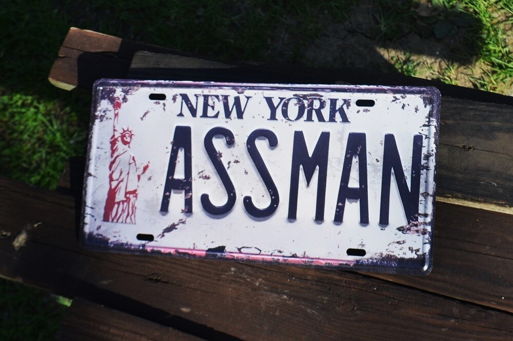 New York ASSMAN Novelty License Plate Tin Sign - Jerry Seinfeld - Cosmo ...